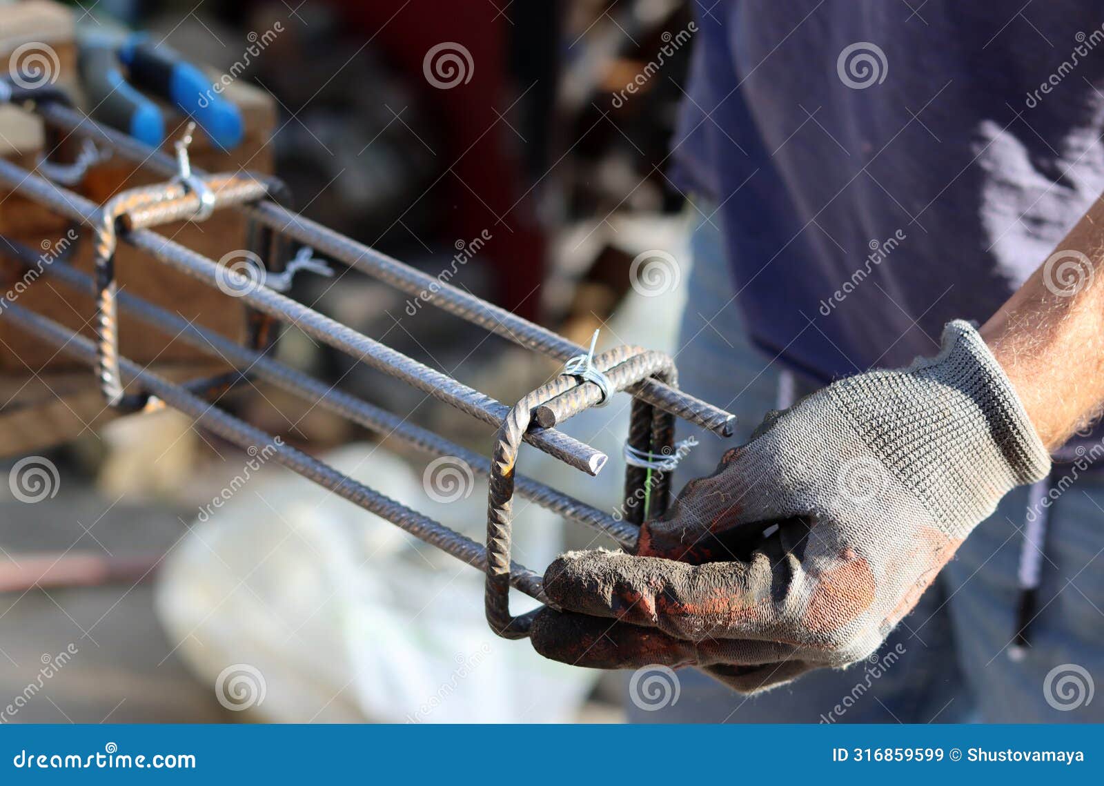 Hand Holding Reinforcement Steel. Professional Construction Worker ...