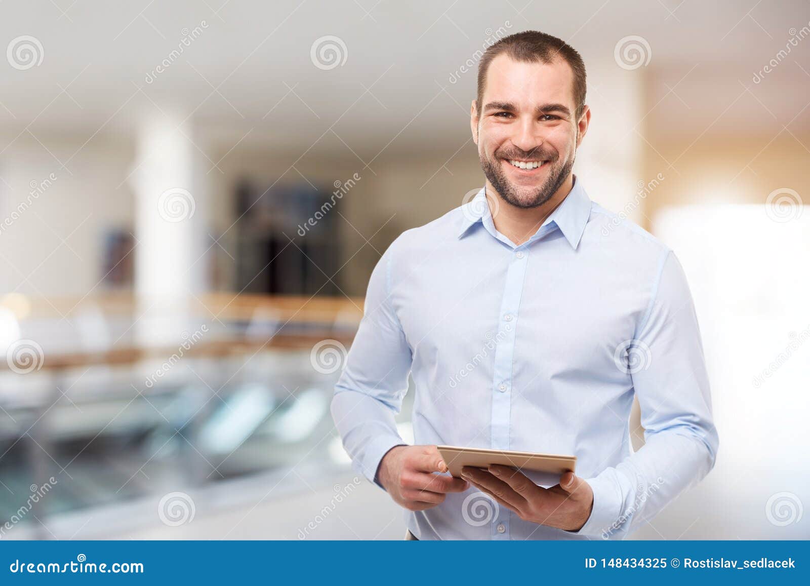 Business Man in the Business Center with Tablet Computer Stock Image ...