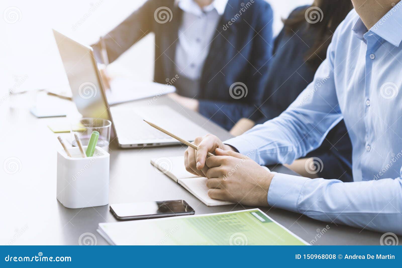Professional Business Team Working Together at Desk Stock Photo - Image ...