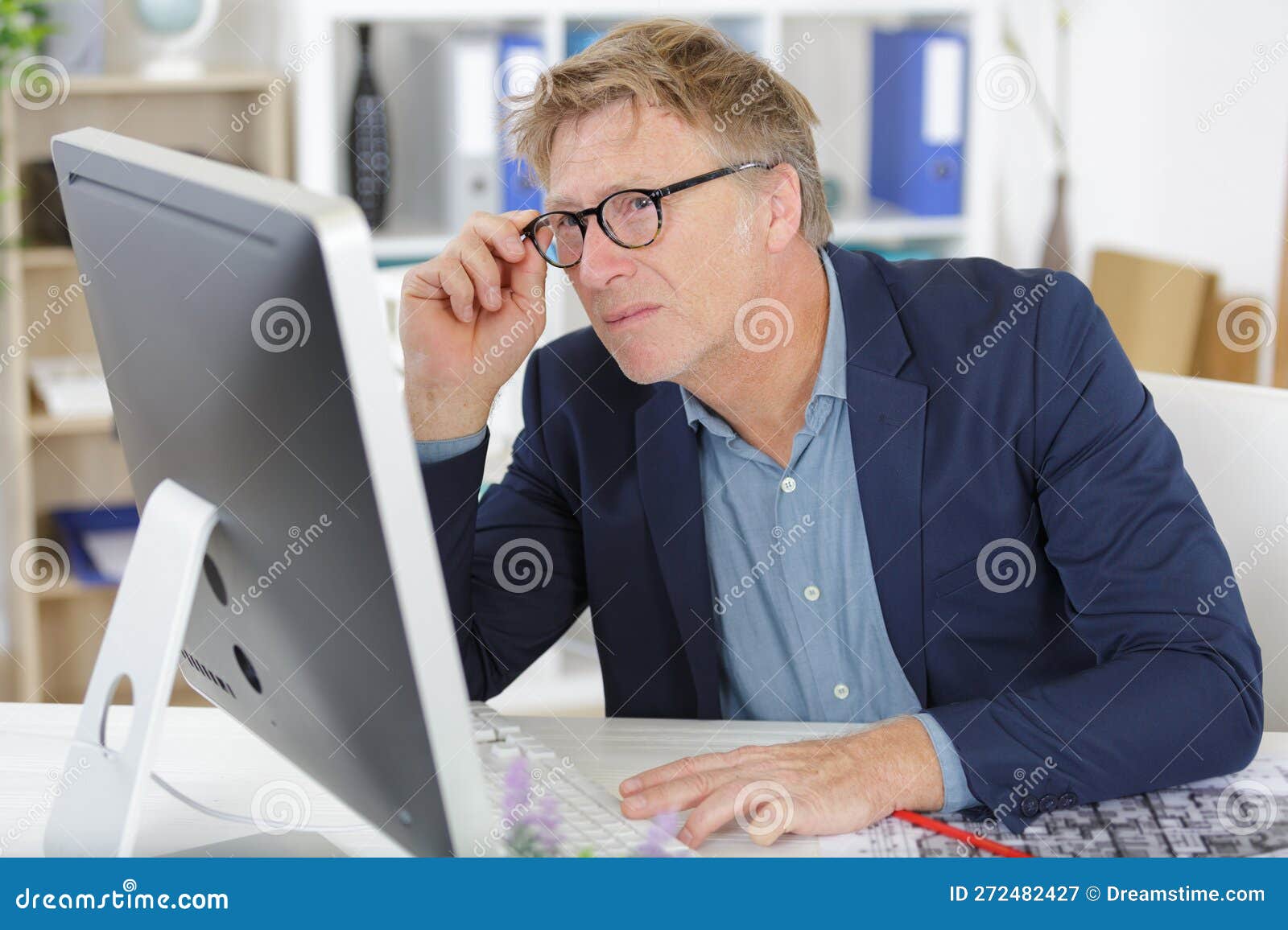 Professional Businessman in Formal Suit Reading Information on Pc ...
