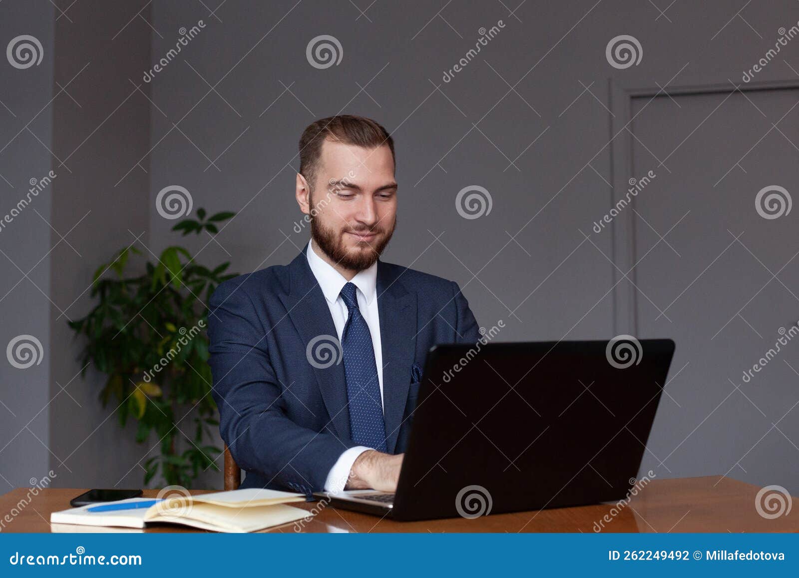 Professional Businessman is Working on New Project on His Computer ...