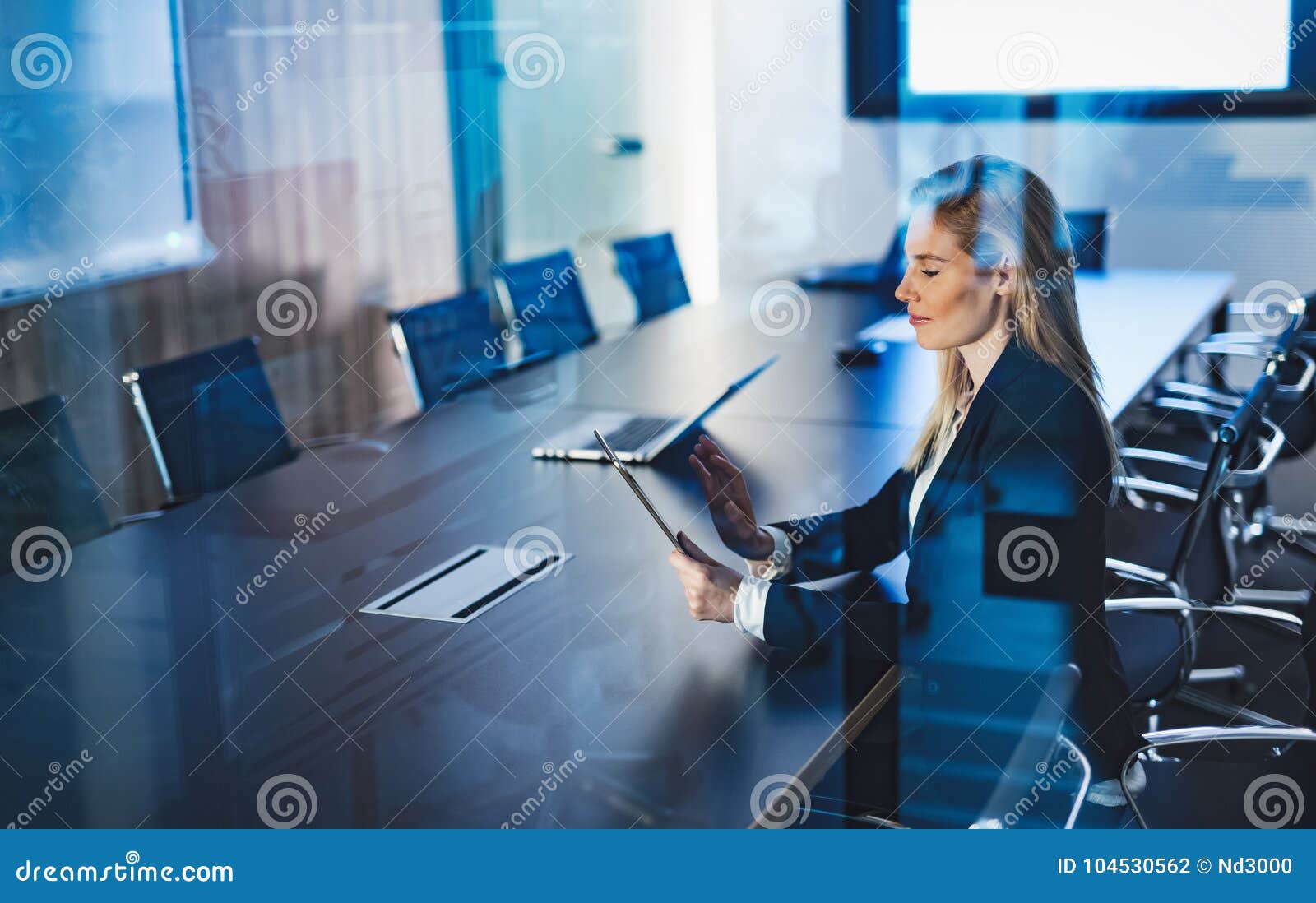 Businesswoman Using Tablet in Conference Room Stock Photo - Image of ...