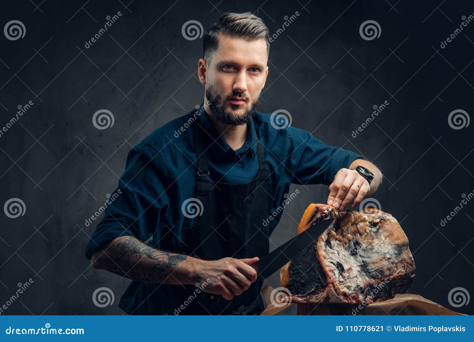 Professional Butcher is Cutting Raw Smoked Meat on a Table for C Stock ...