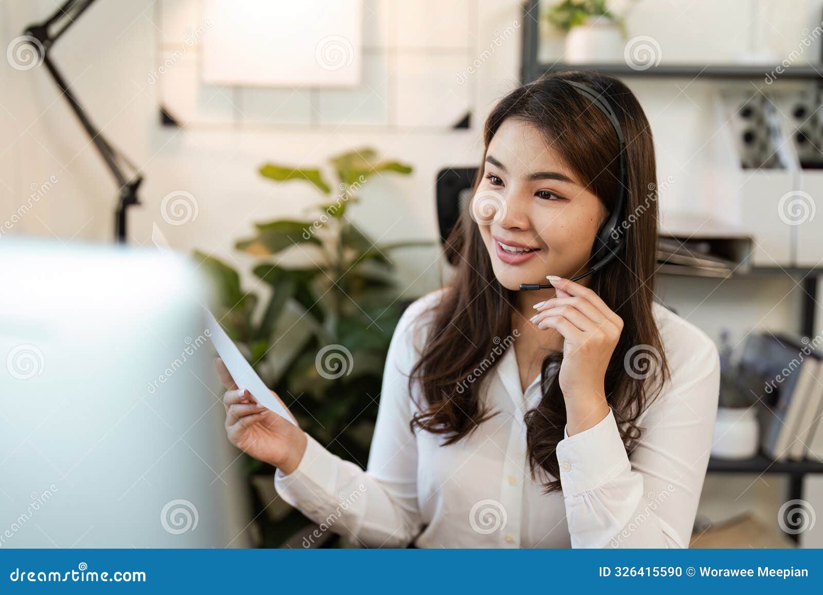 Professional Call Center Agent Providing Customer Support in a Modern ...