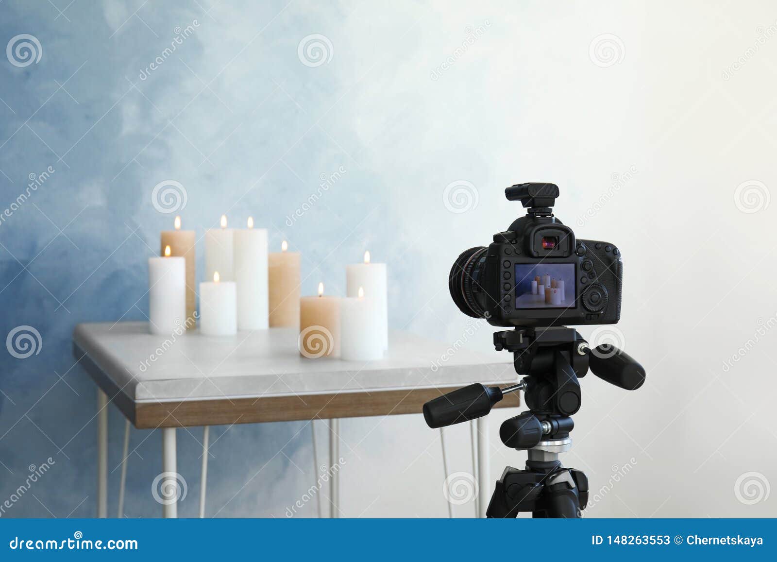 Professional Camera and Candles on Table Stock Image - Image of candles ...