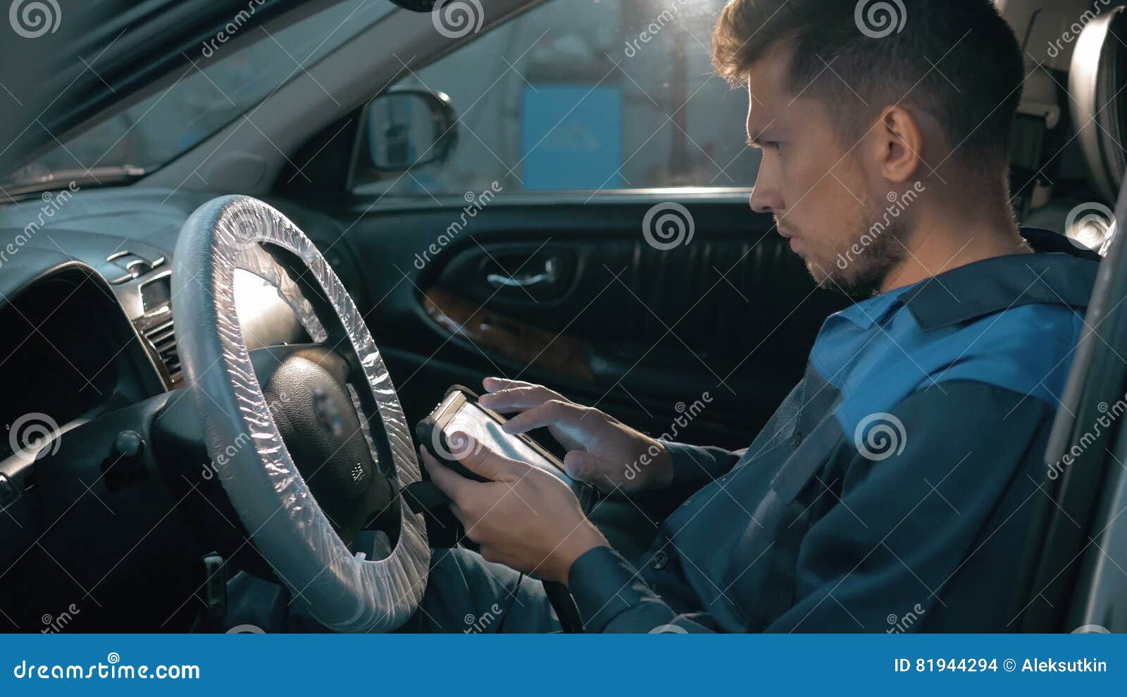 Professional Car Mechanic Working in Modern Auto Repair Service and ...