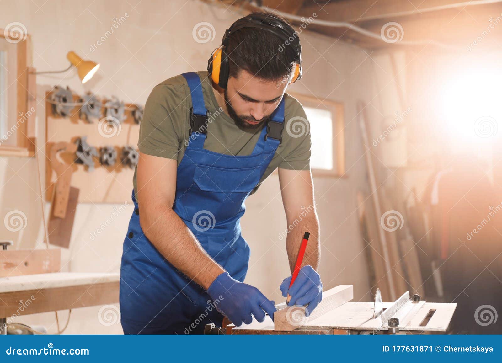 Professional Carpenter Making Mark on Bar in Workshop Stock Image ...