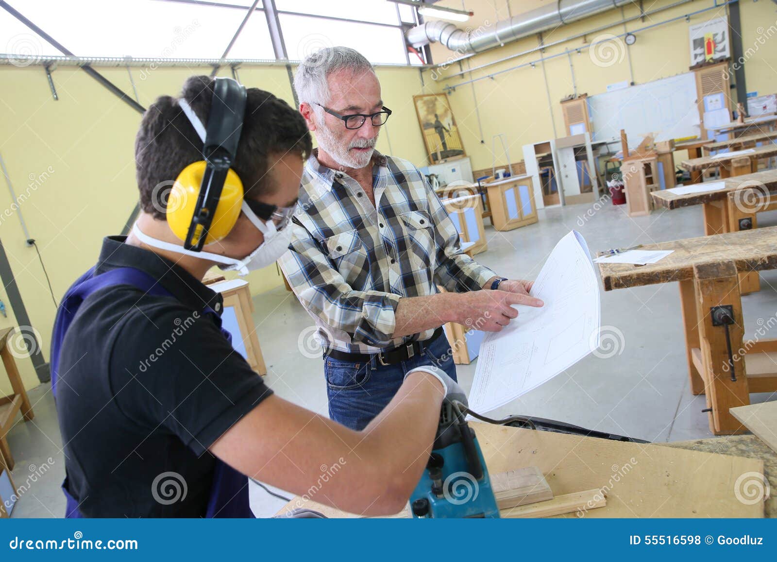 Professional Carpenter with Young Apprentice Stock Photo - Image of ...