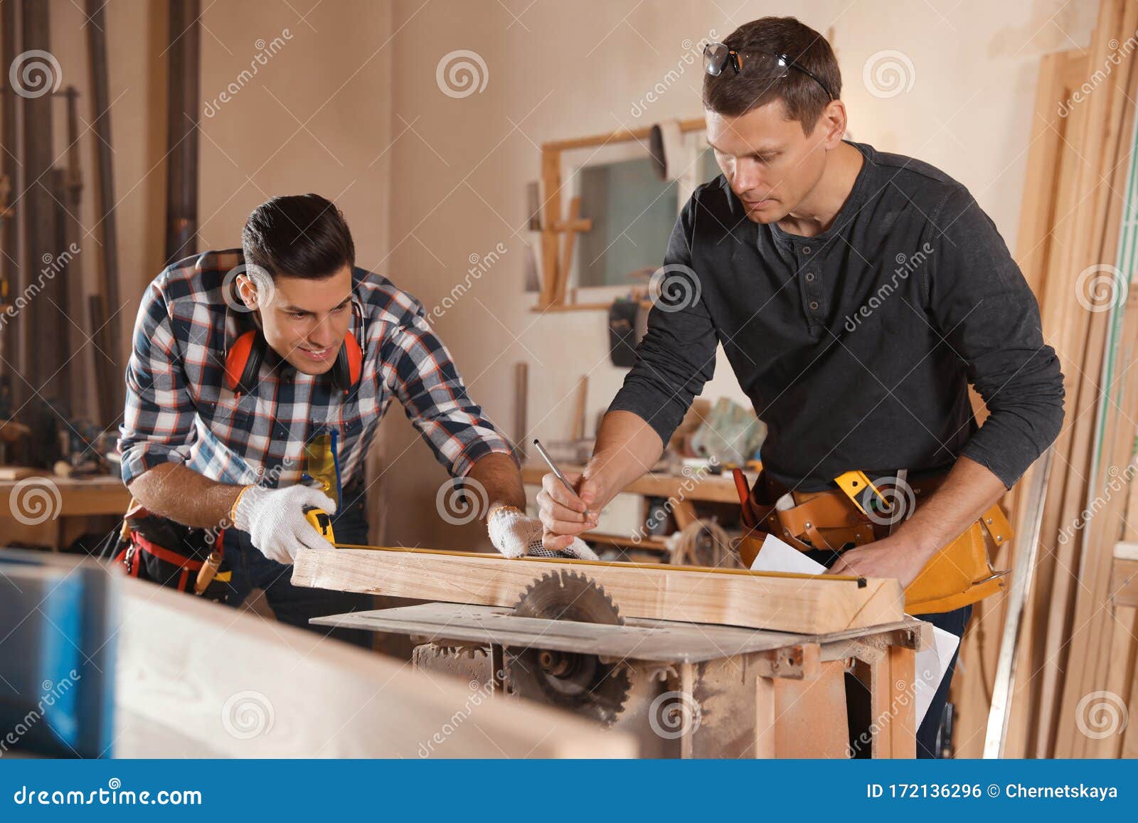 Professional Carpenters Working with Sawmill Machine Stock Photo ...