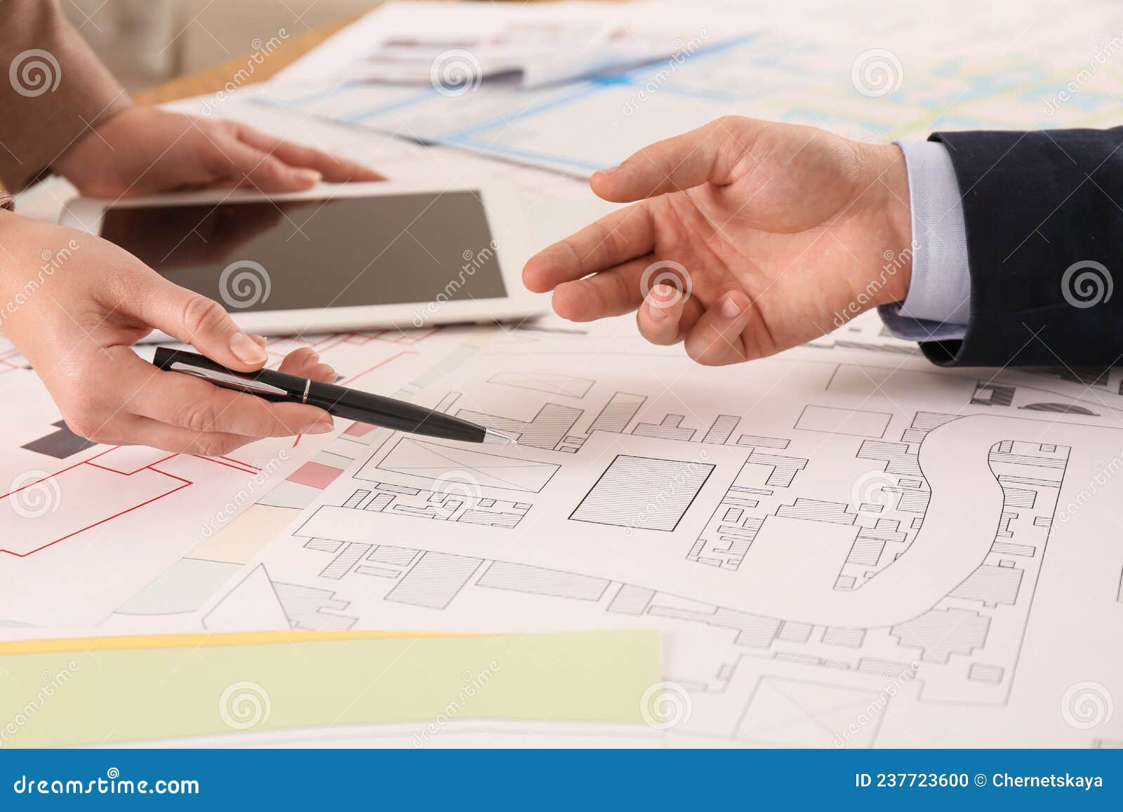 Professional Cartographers Working with Cadastral Map at Table, Closeup ...