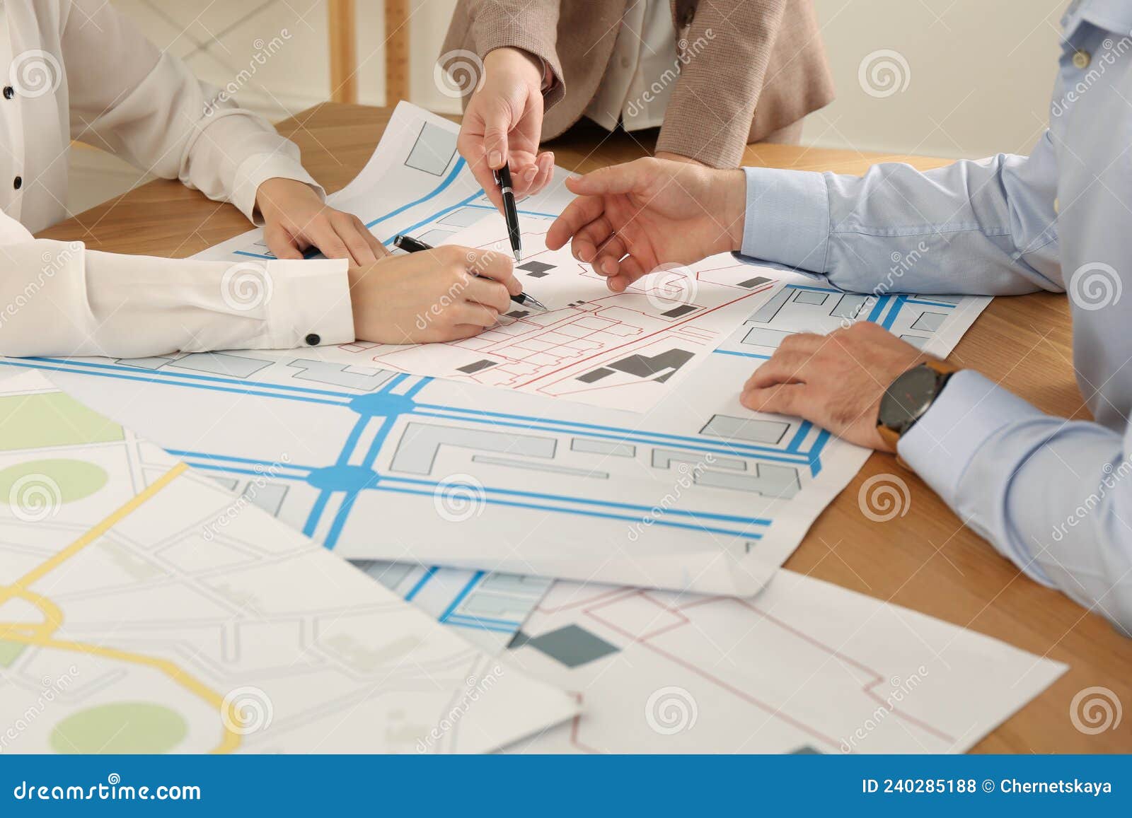 Professional Cartographers Working with Cadastral Map at Table, Closeup ...