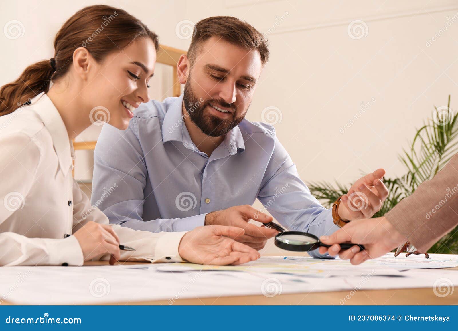 Professional Cartographers Working with Cadastral Map at Table in ...