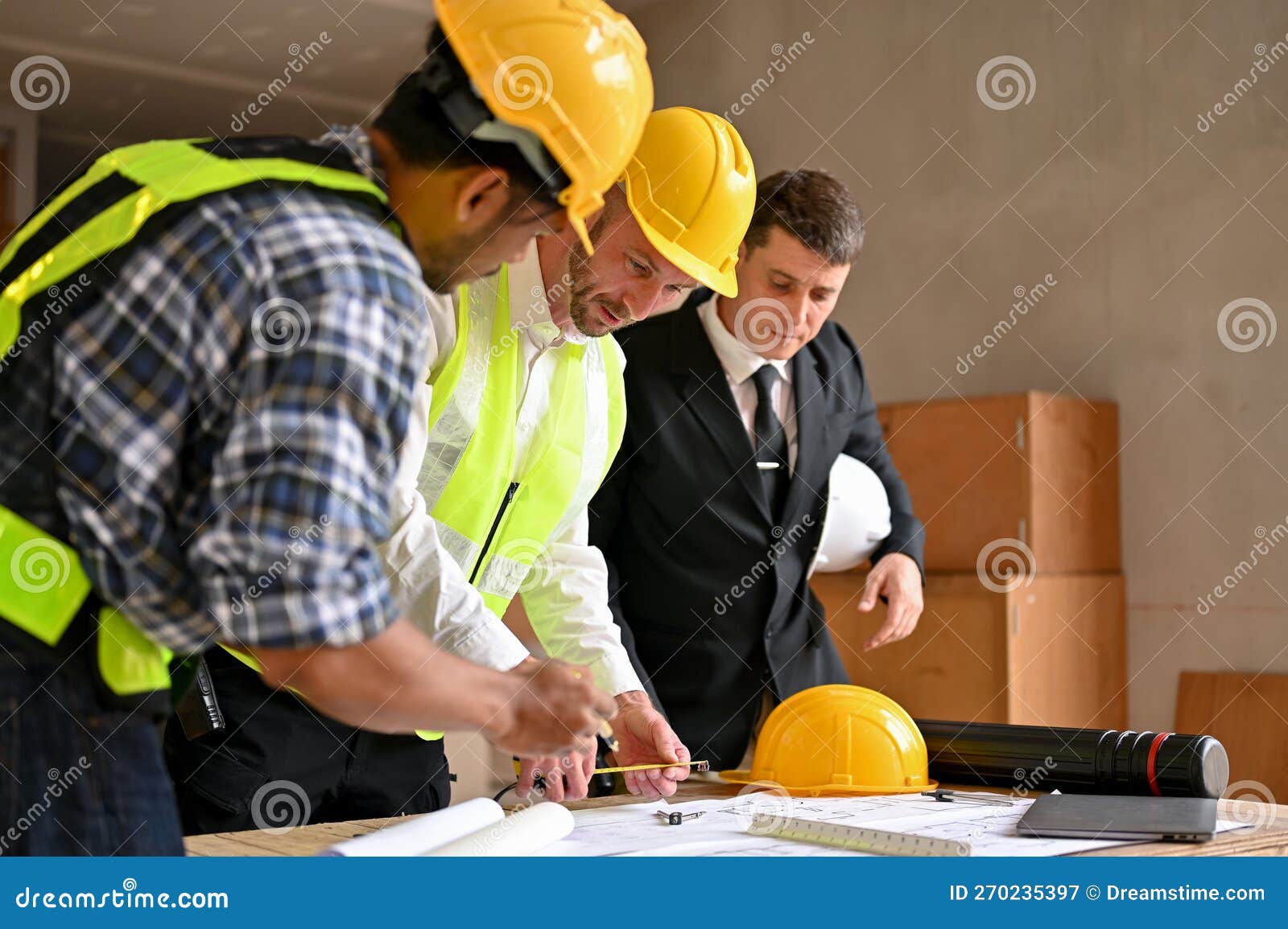 Group of Construction Engineer Working at the Construction Site with a ...