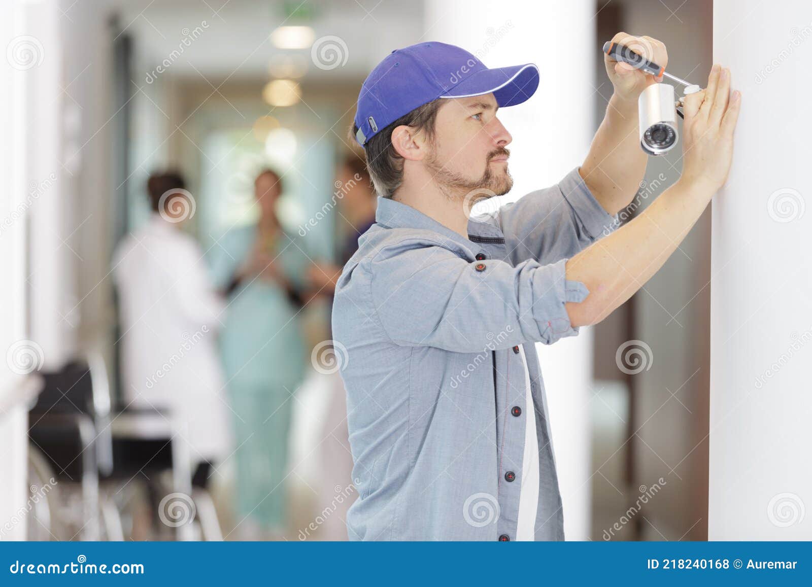 Professional Cctv Technician Working Stock Photo - Image of coveralls ...