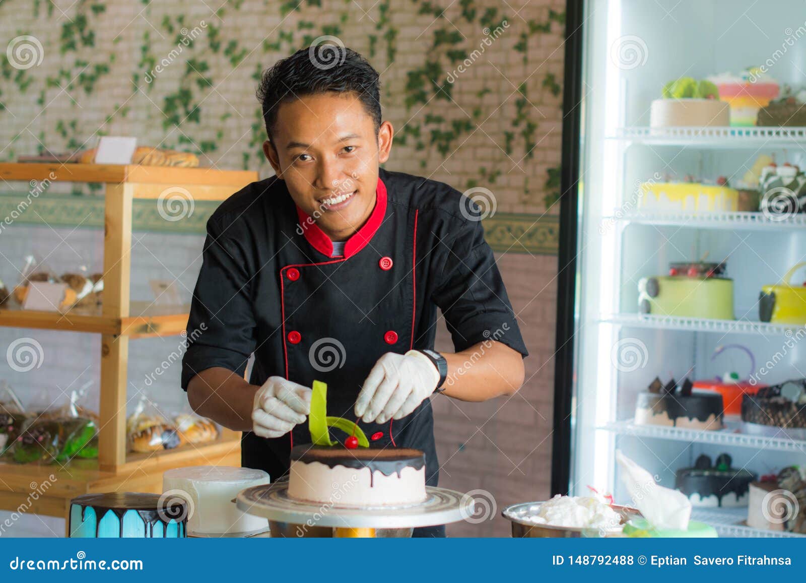 Professional Asian Pastry Chef Decorating Cake Puting Red Cherry Stock ...