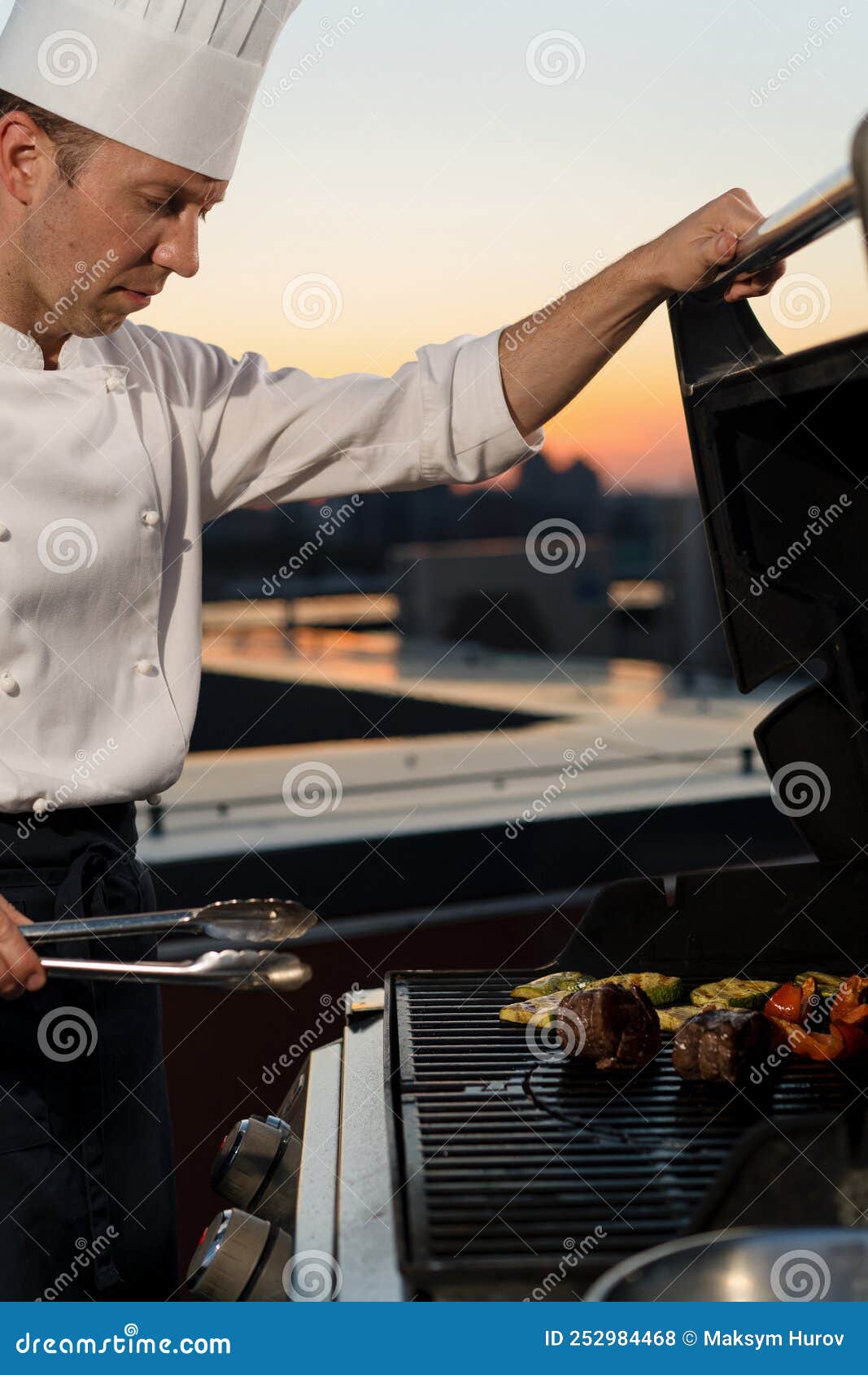 Professional Chef Cooking Bbq on Rooftop at Sunset Stock Photo - Image ...