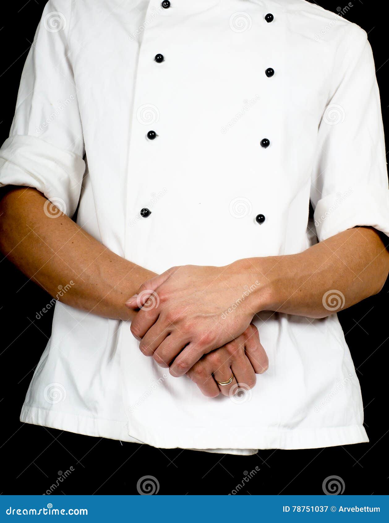 Professional Chef with a Hand Gesture Towards, Wearing a Chefs J Stock ...