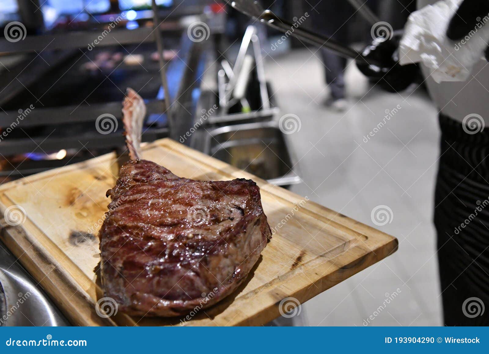 Professional Chef Making Delicious Steak at a Restaurant Stock Photo ...