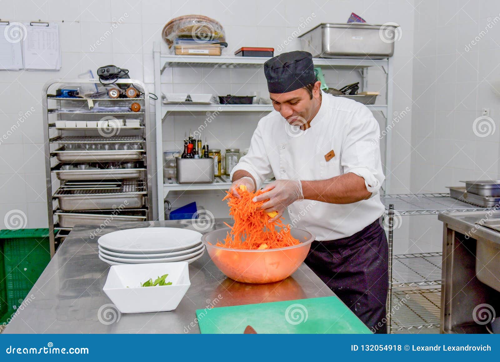 Professional Chef Mixing Ingredients for Salad in the Bowl Editorial ...