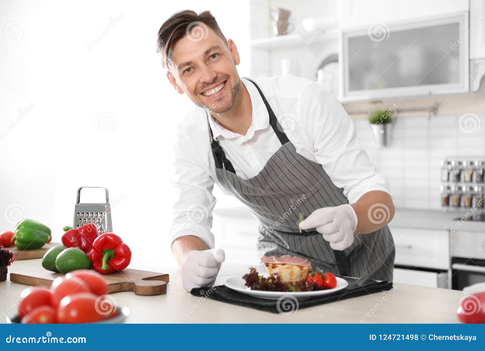 Professional Chef Presenting Dish on Table Stock Photo - Image of ...