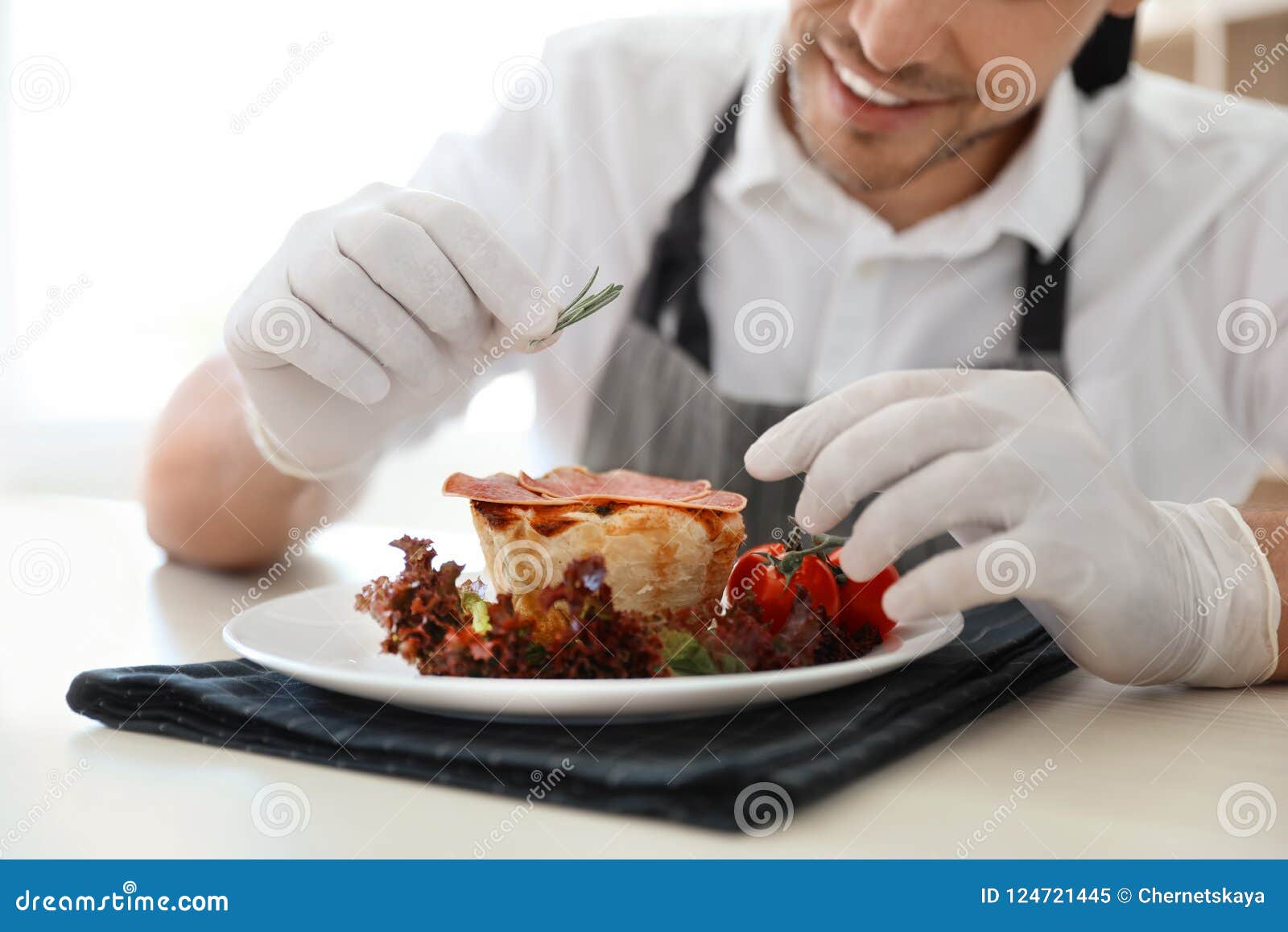 Professional Chef Presenting Dish on Table in Kitchen Stock Image ...
