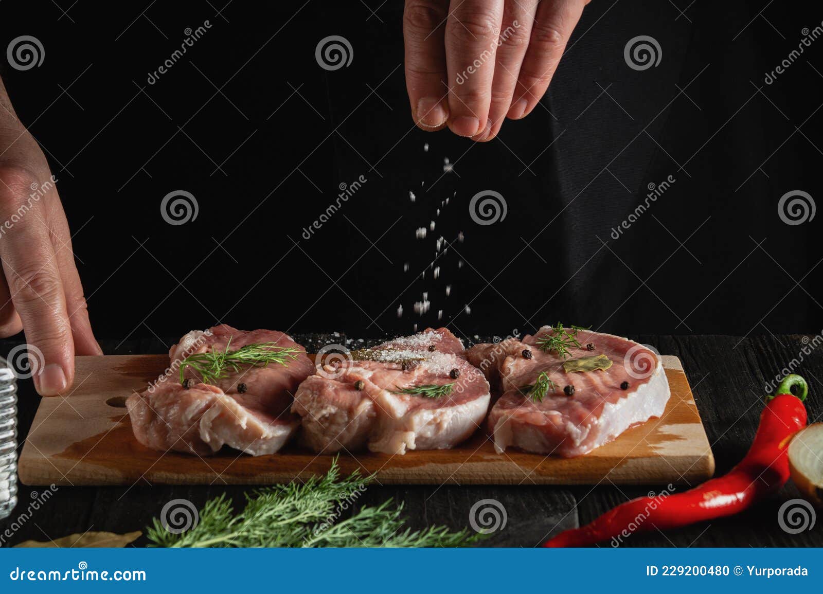Professional Chef Sprinkles the Meat with Salt. Preparing Meat before ...