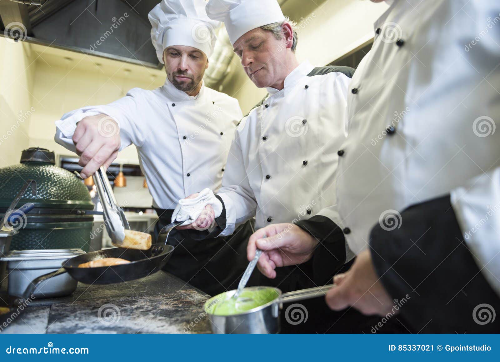Professional chef at work stock image. Image of preparing - 85337021