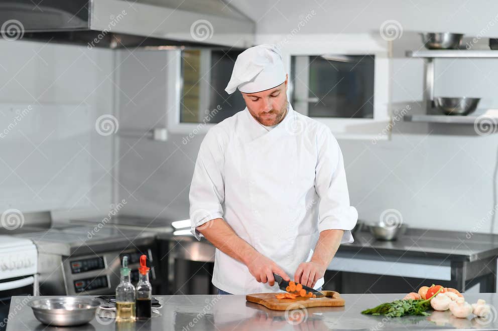 Professional Chef Working in a Famous Restaurant Kitchen Stock Image ...