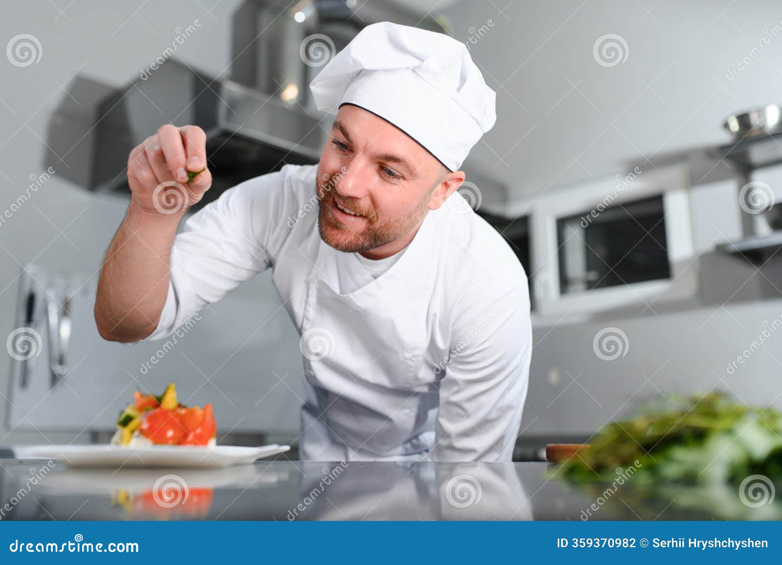 Professional Chef Working in a Famous Restaurant Kitchen Stock Photo ...