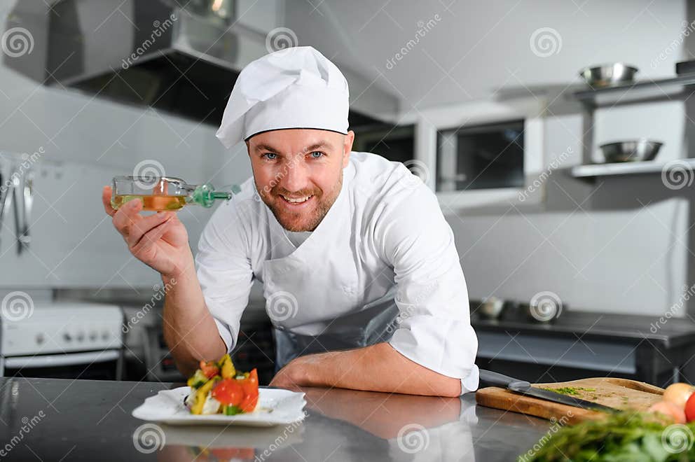 Professional Chef Working in a Famous Restaurant Kitchen Stock Photo ...