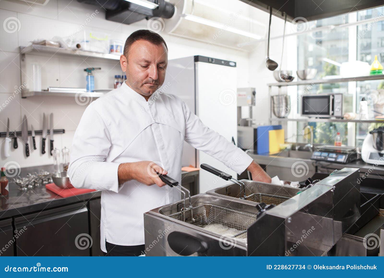 Professional Chef Working at Restaurant Kitchen Stock Photo - Image of ...