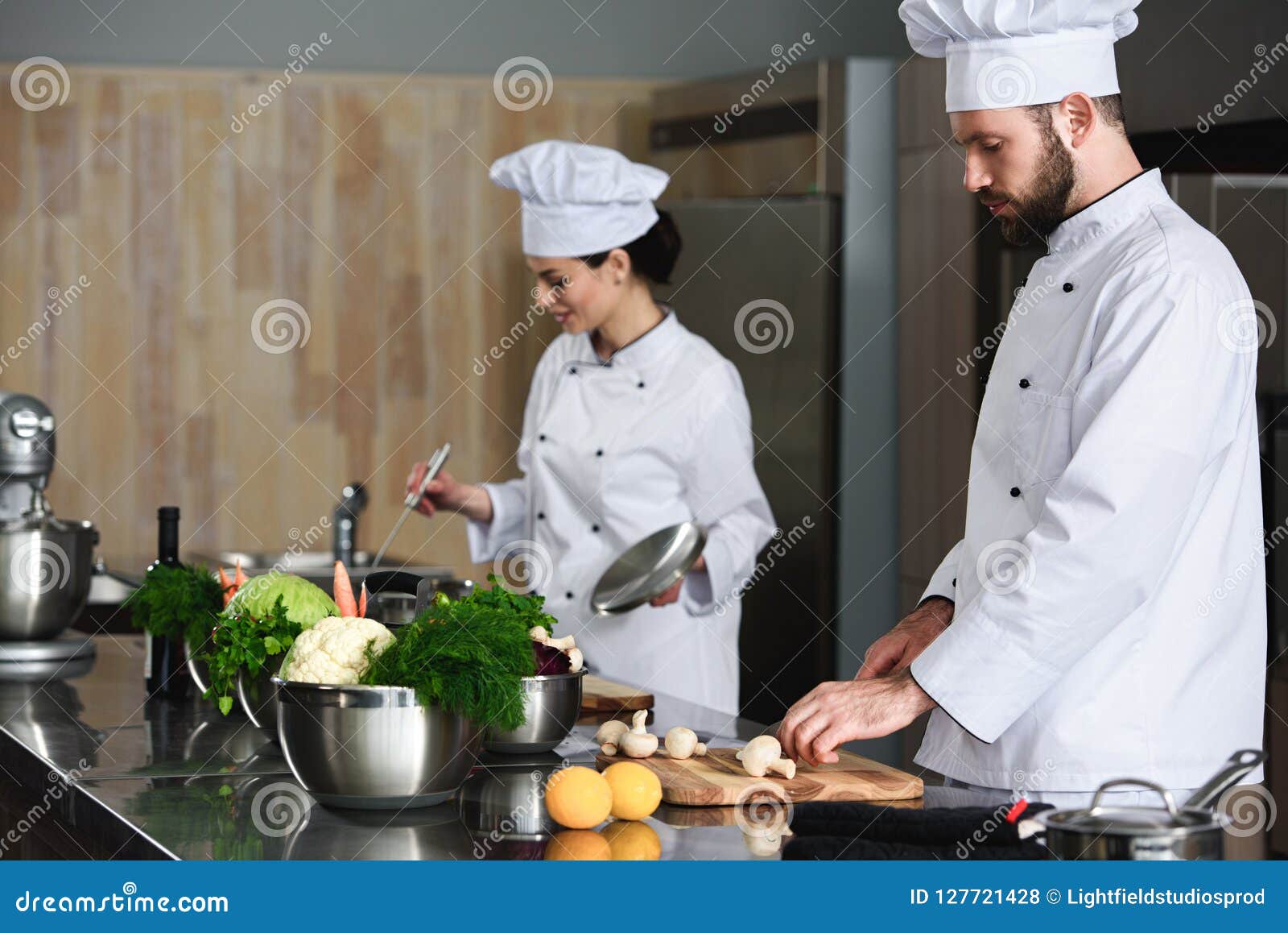 Professional Chefs Busy Cooking Stock Photo - Image of handsome ...