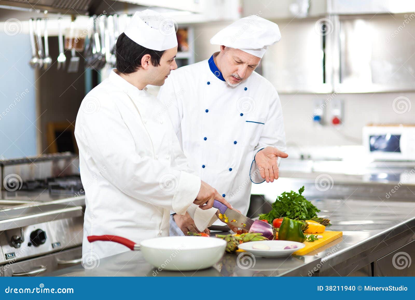 Professional chefs at work stock photo. Image of cutting - 38211940