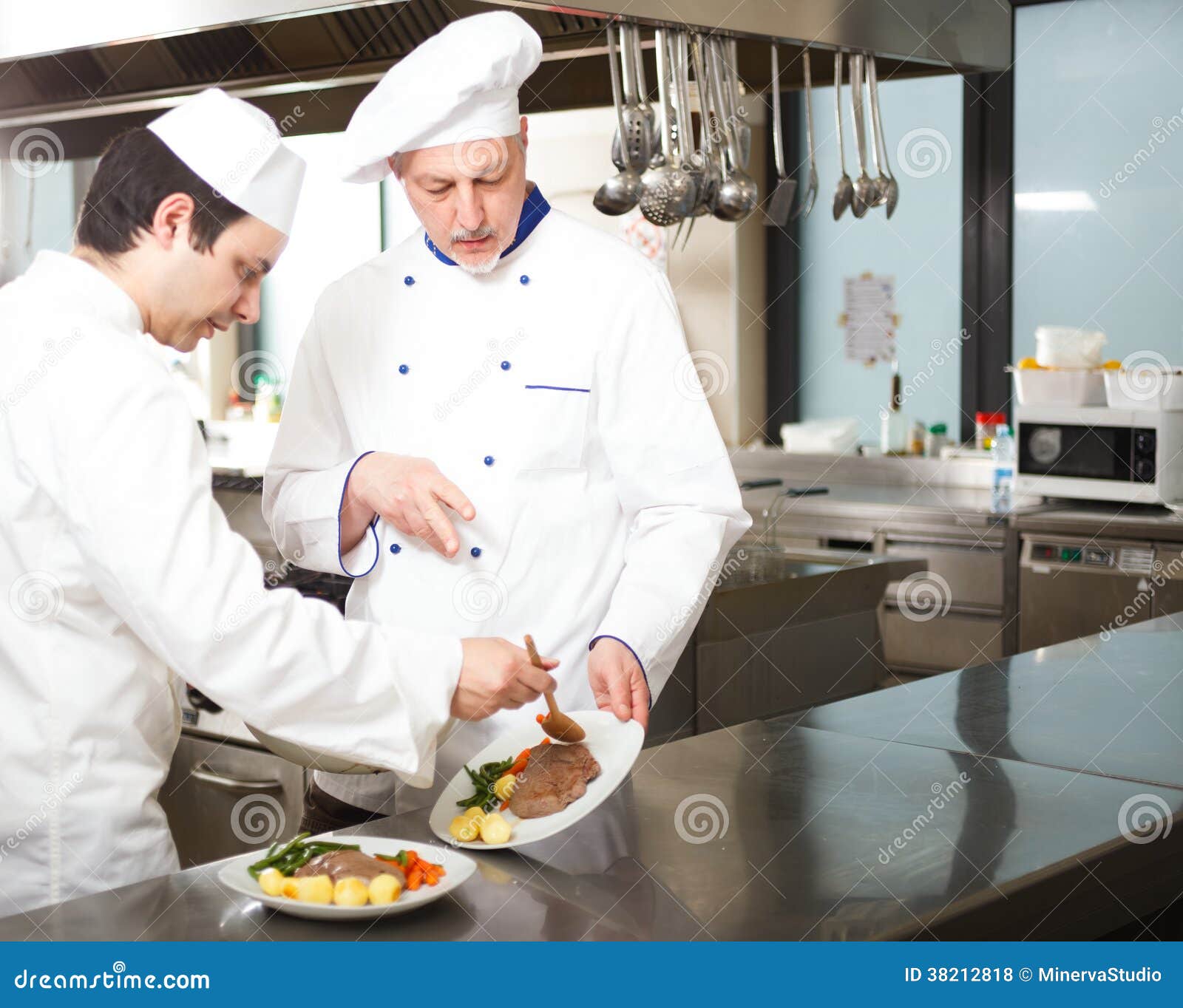 Professional chefs at work stock photo. Image of indoor - 38212818