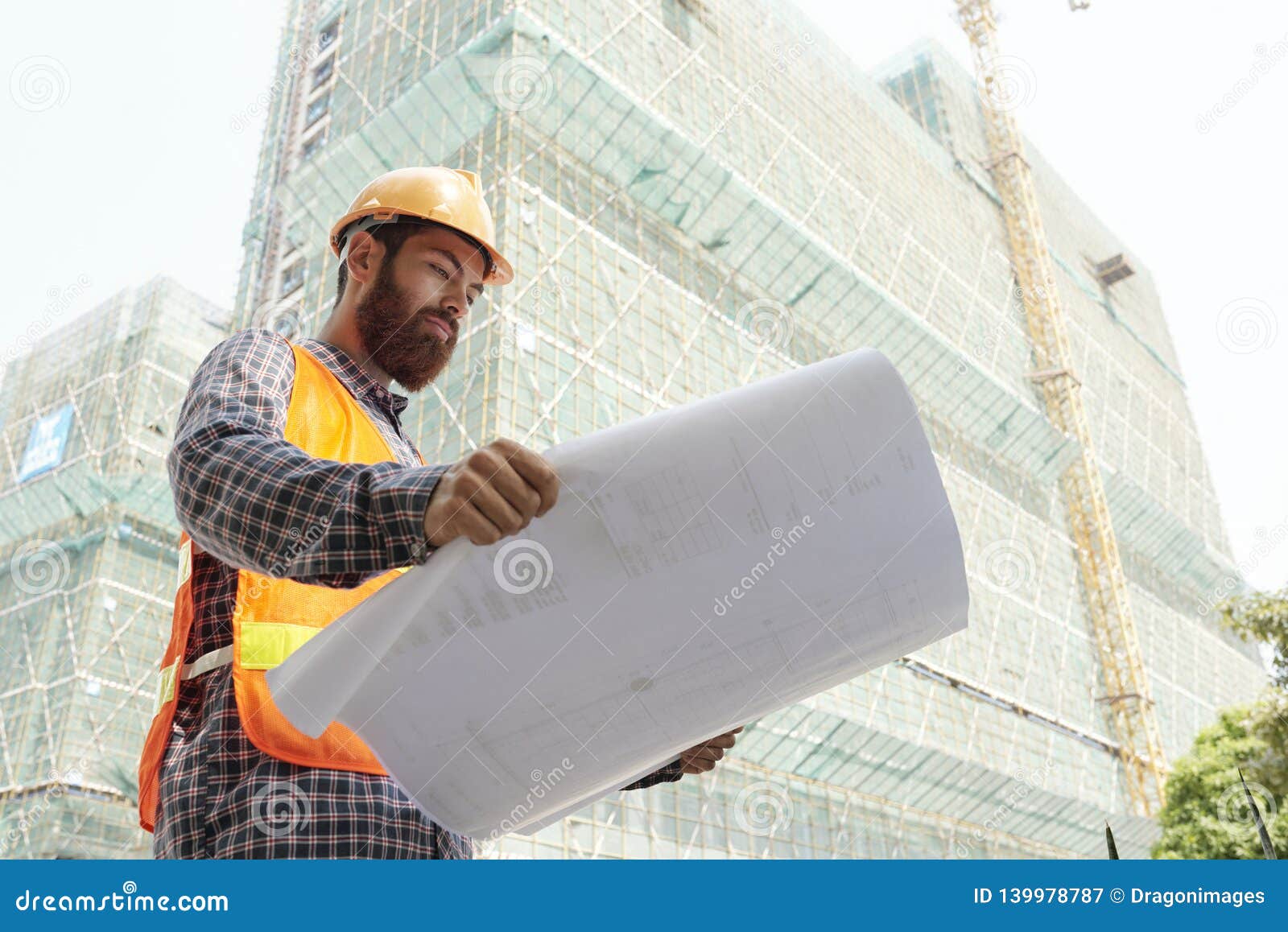 Civil Engineer Examining Blueprint Stock Image - Image of occupation ...