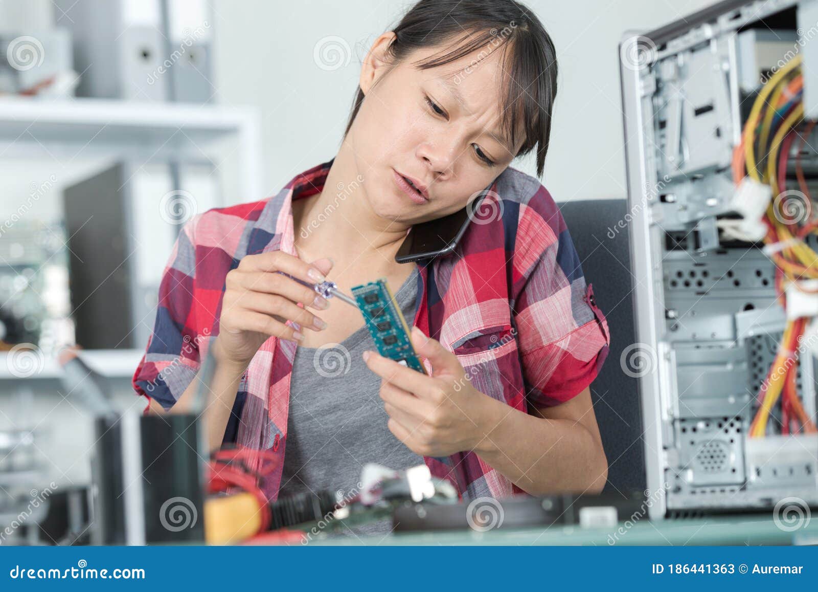 Professional Computer Engineer Talking To Customer while Fixing Pc ...