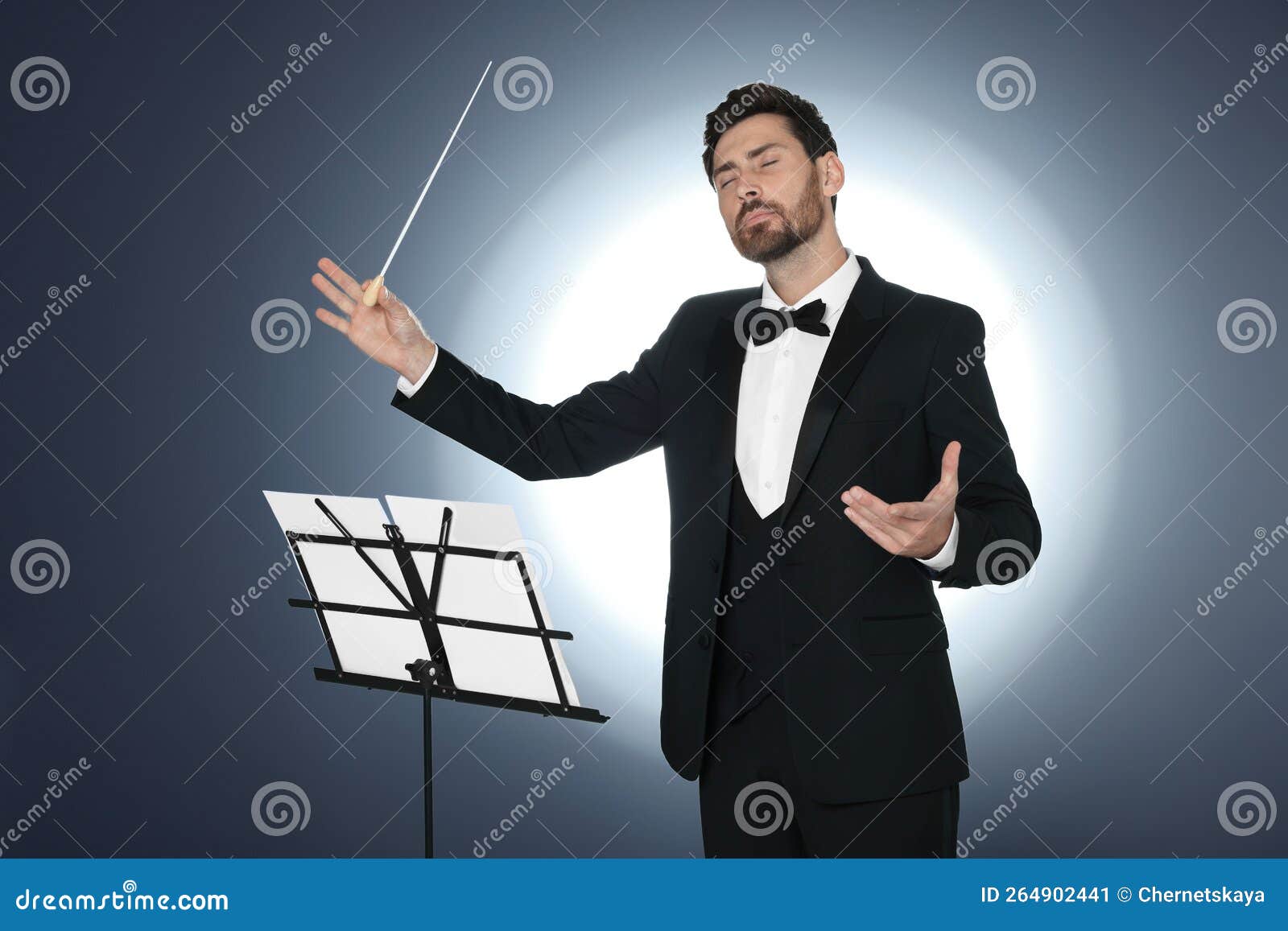 Professional Conductor with Baton and Note Stand on Grey Background ...