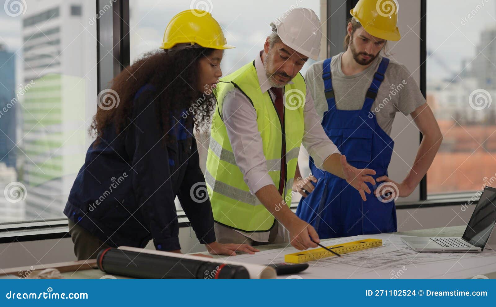 Professional Construction Engineers Team Using Blueprint of Project ...