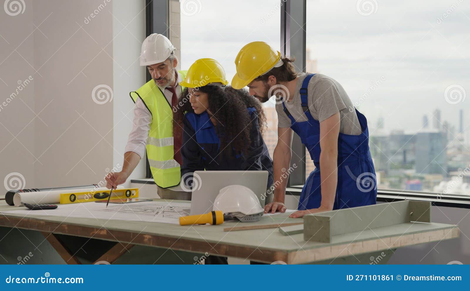 Professional Construction Engineers Team Using Blueprint of Project ...