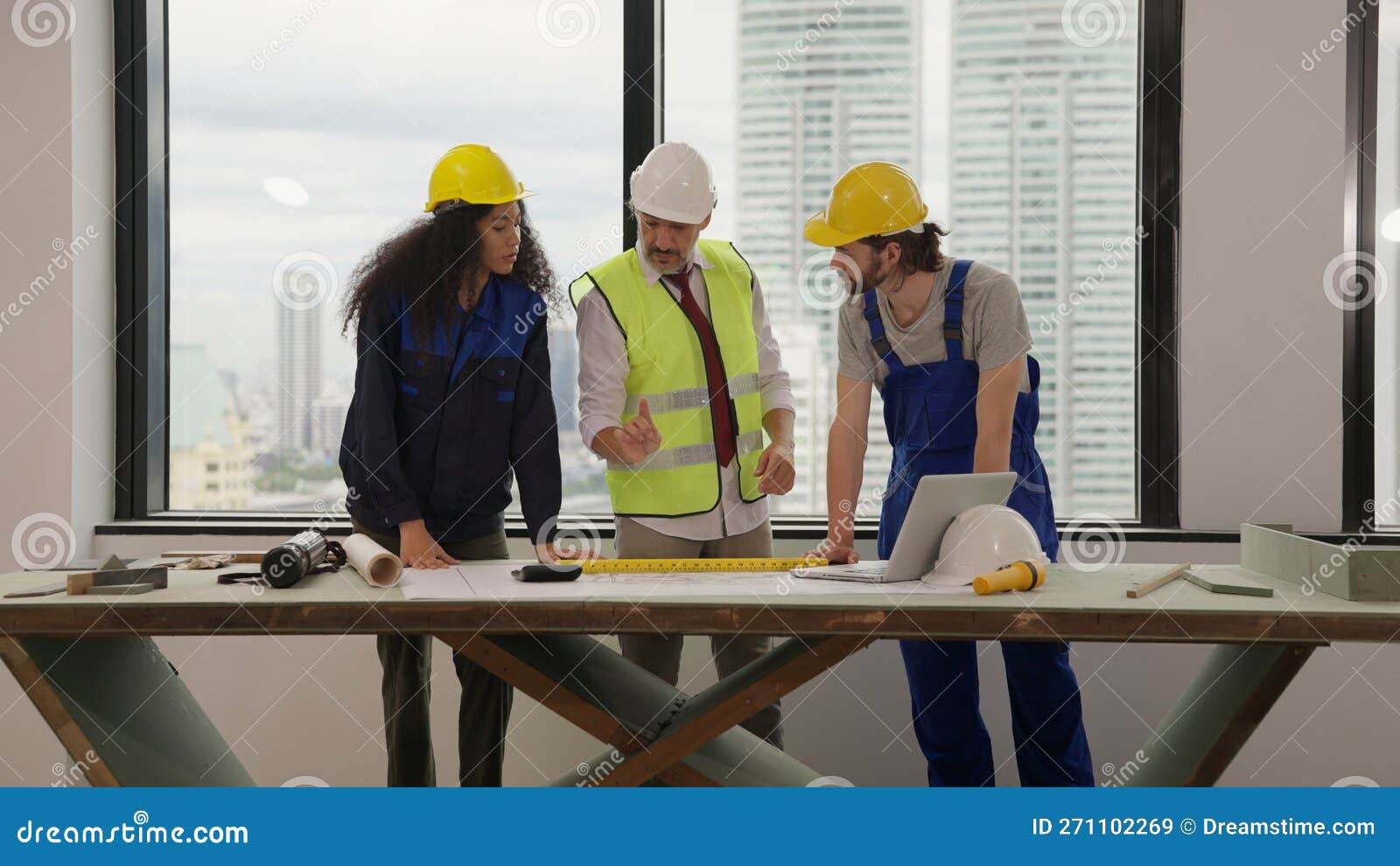 Professional Construction Engineers Team Using Blueprint of Project ...