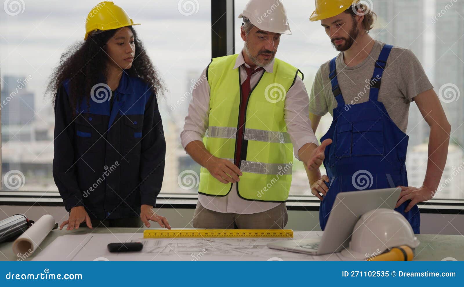 Professional Construction Engineers Team Using Blueprint of Project ...