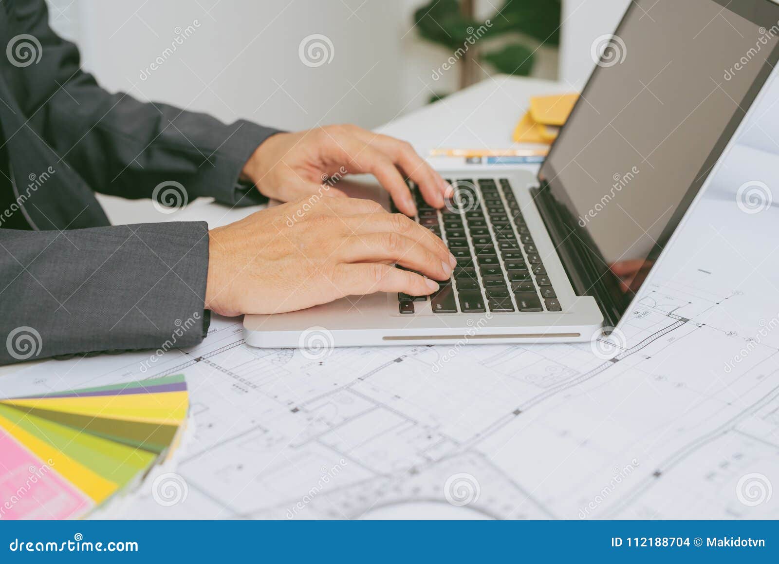 Professional Construction Manager Working with Blue Print in Off Stock ...