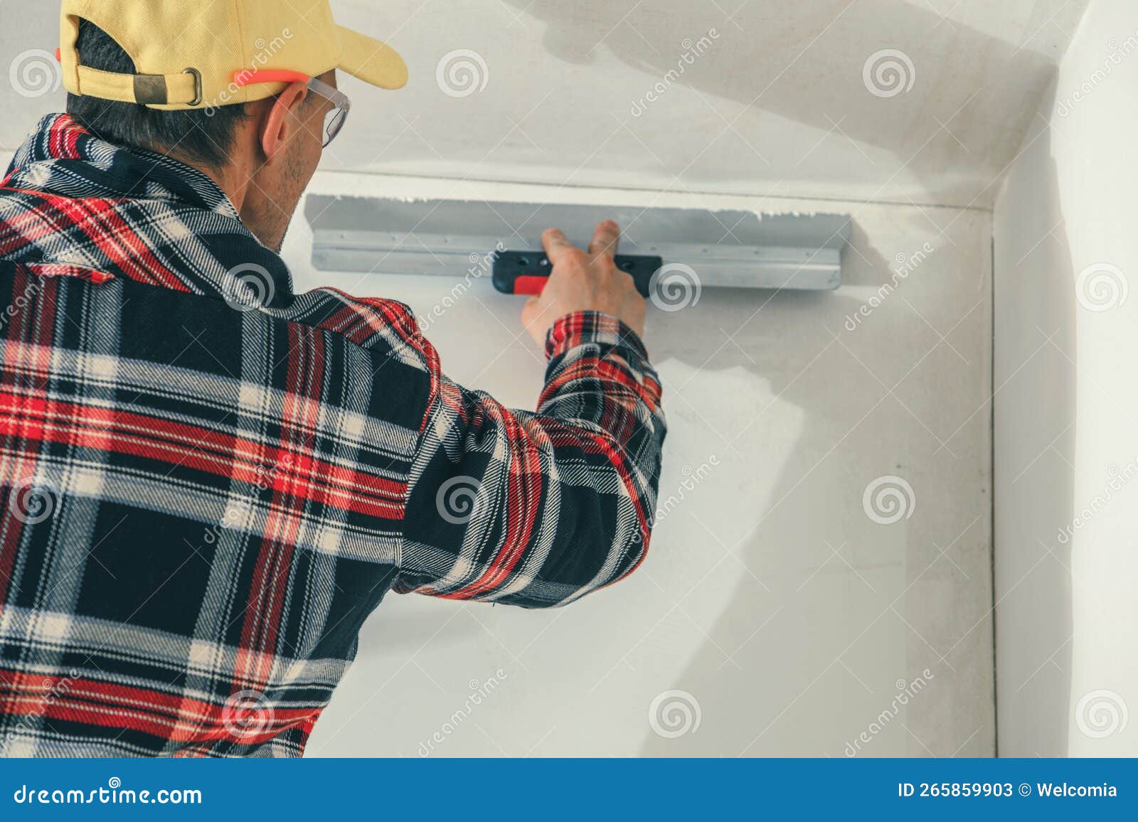 Professional Plasterer Performing Wall Renovation Using Plastering ...