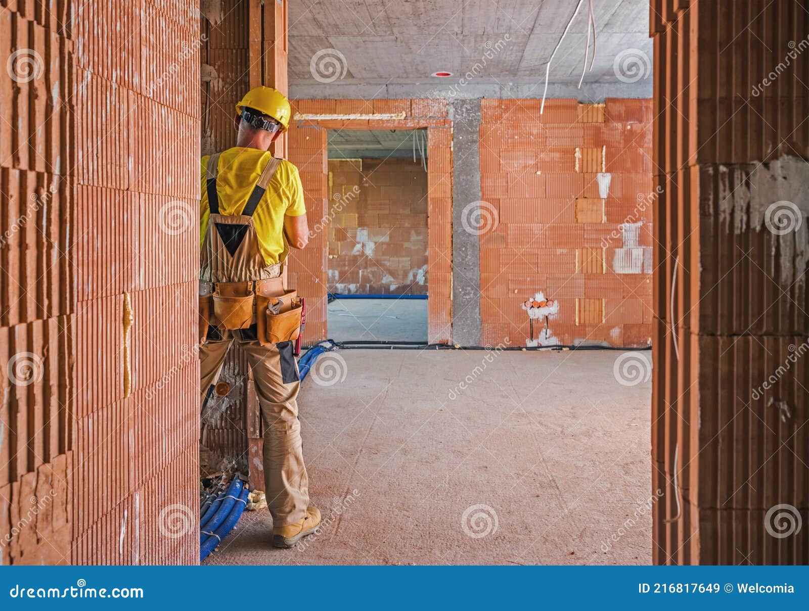 Professional Construction Worker Inside Brick Built Building Stock ...