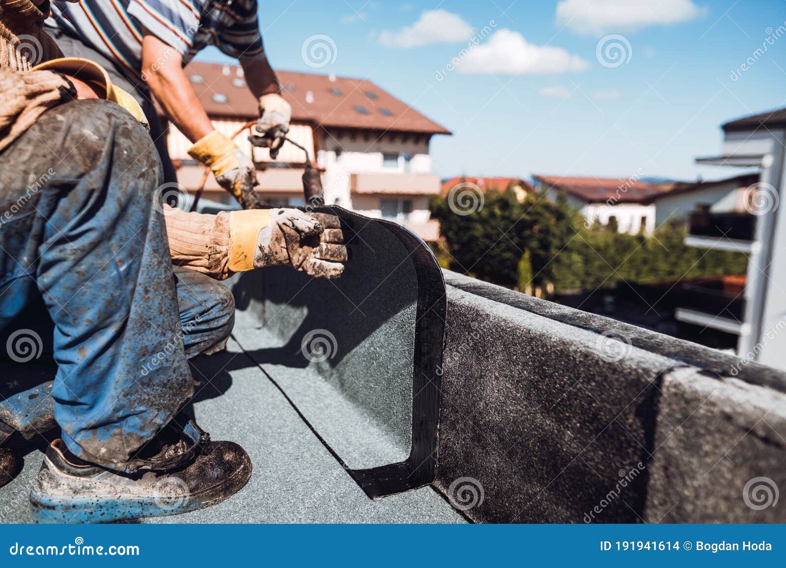Professional Construction Worker Installing and Waterproofing Flat Roof ...