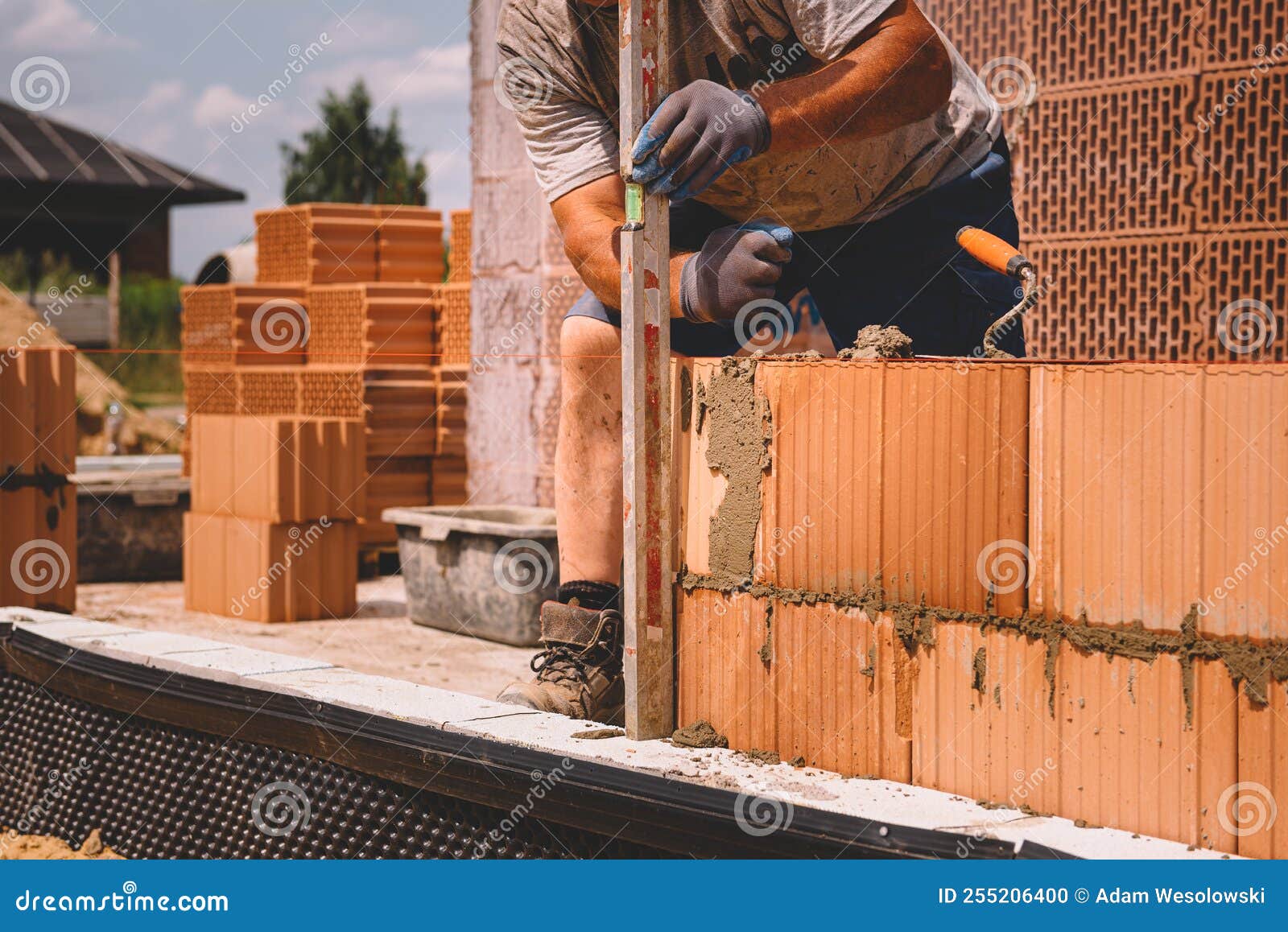Professional Construction Worker Laying Bricks and Mortar - Building ...