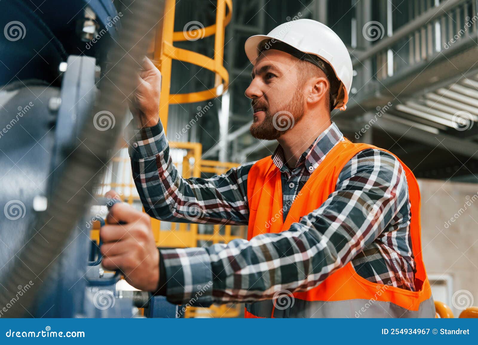 Professional Construction Worker in Uniform is in the Factory Stock ...