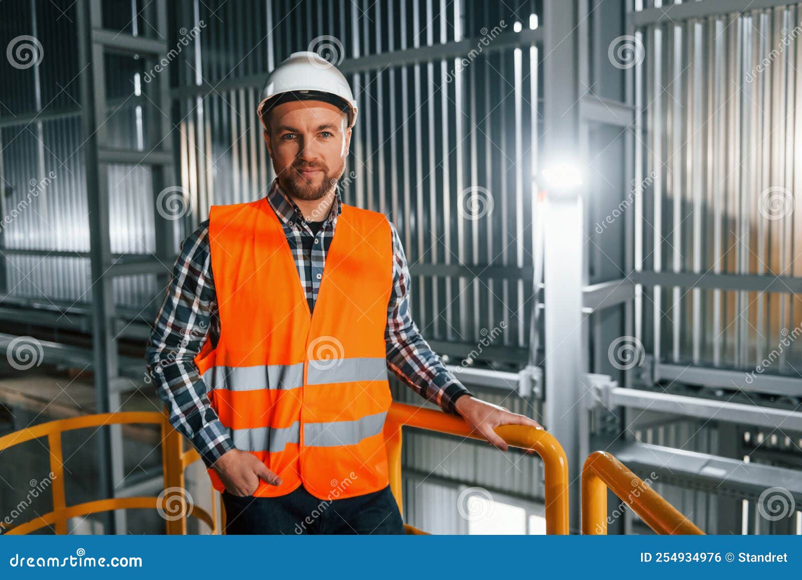 Professional Construction Worker in Uniform is in the Factory Stock ...