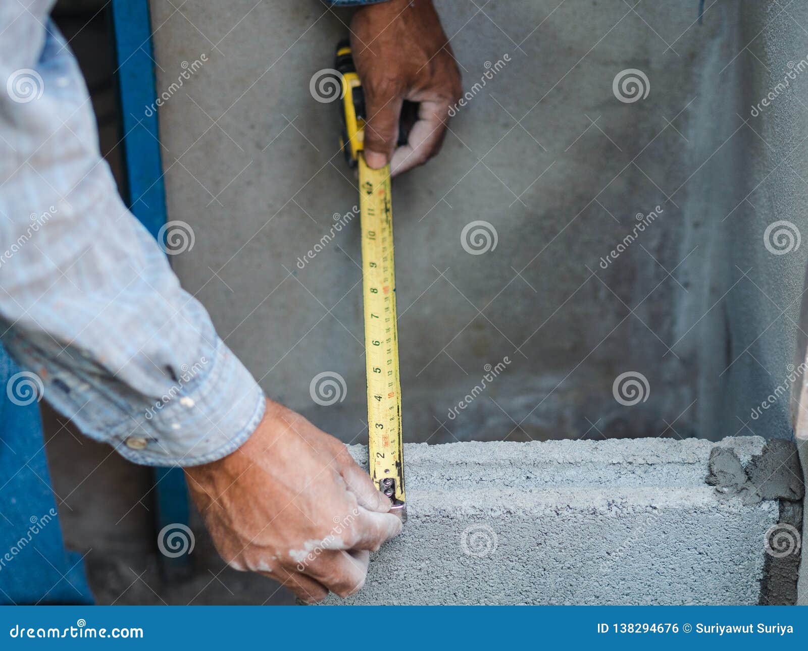 Professional Construction Worker Uses Measuring Tape for Measure and ...