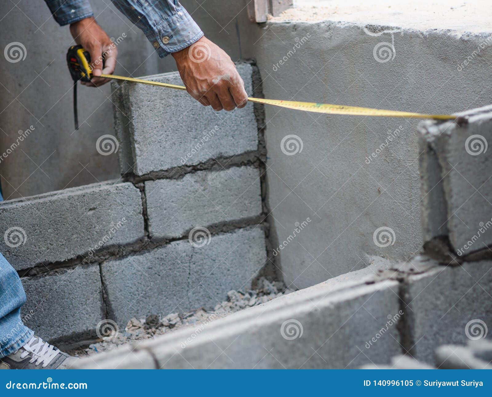 Professional Construction Worker Uses Measuring Tape for Measure and ...